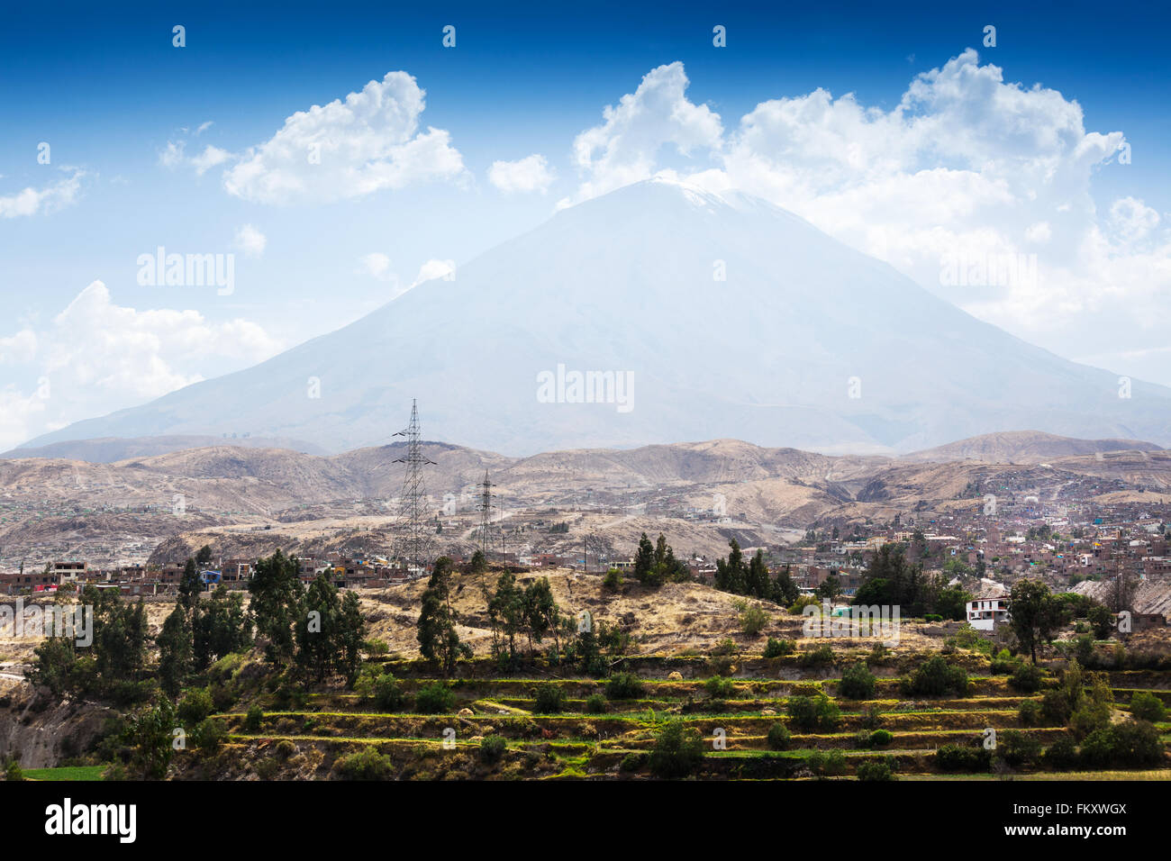 a dormant volcano and the city Stock Photo - Alamy