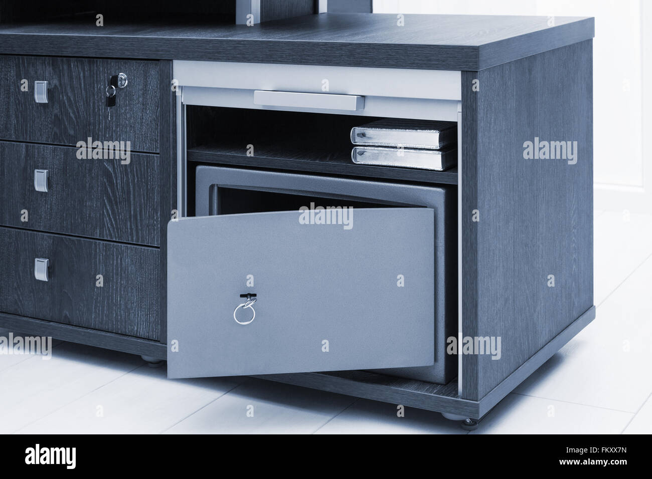 modern metal safe in a office Stock Photo - Alamy