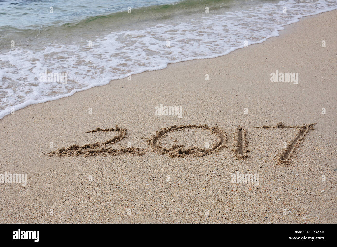 2017 number handwritten on beach hi-res stock photography and images ...