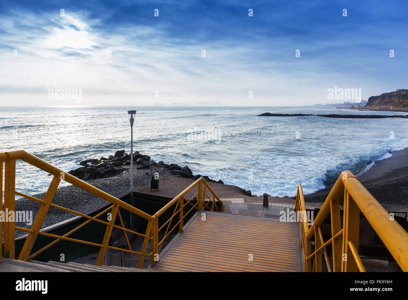 steps to the ocean and sunset Stock Photo - Alamy