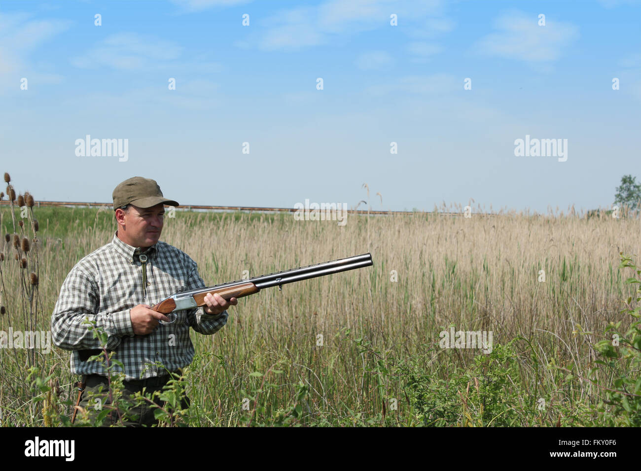 hunter waiting for wild ducks Stock Photo - Alamy