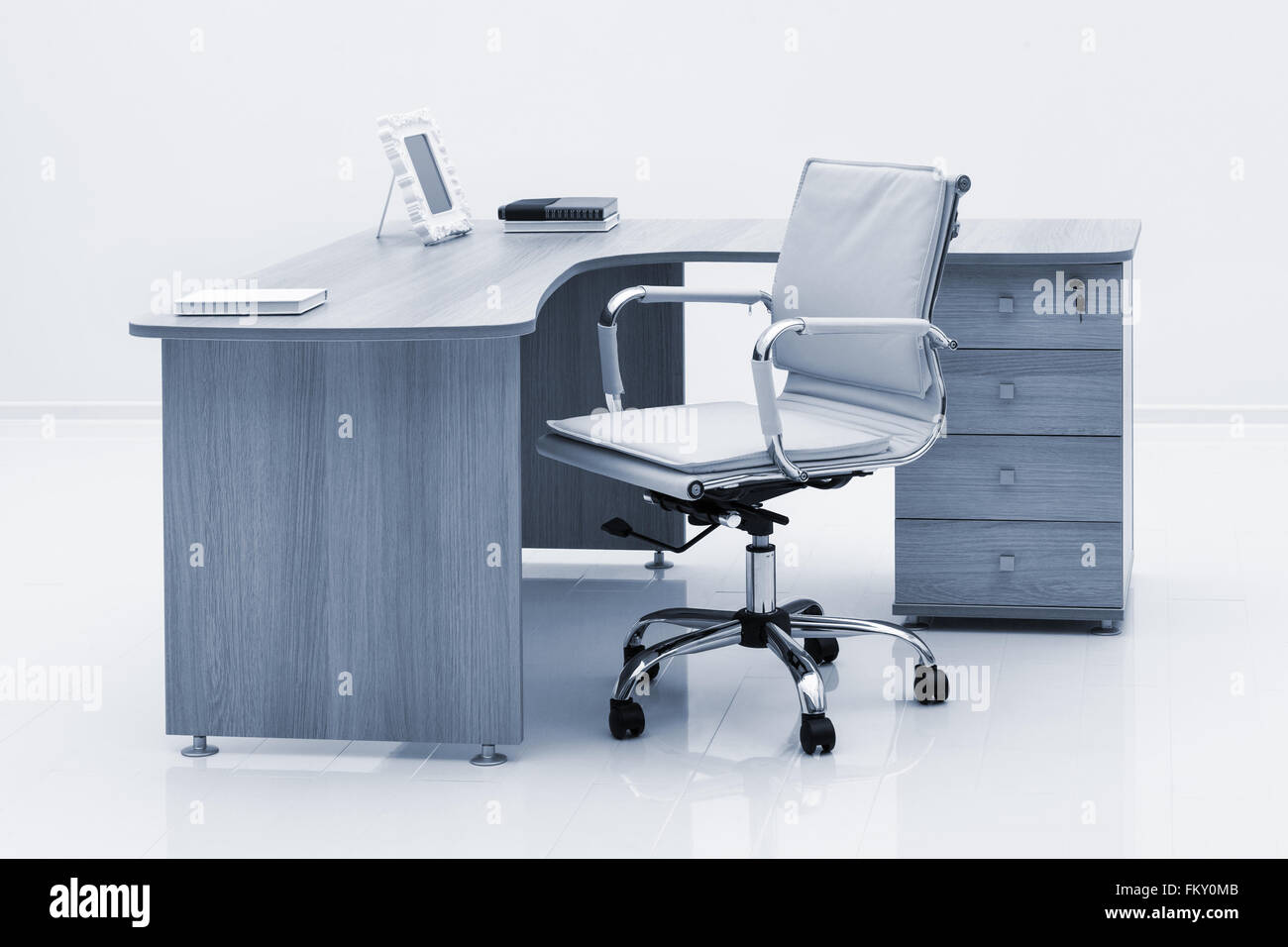 light wood desk in the office Stock Photo - Alamy