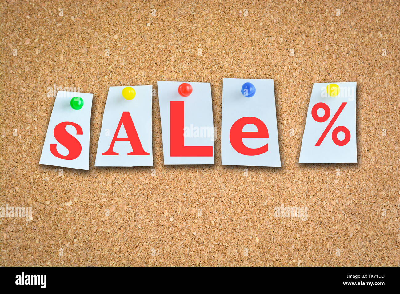 Sale concept with sticky notes on cork billboard and pins Stock Photo ...