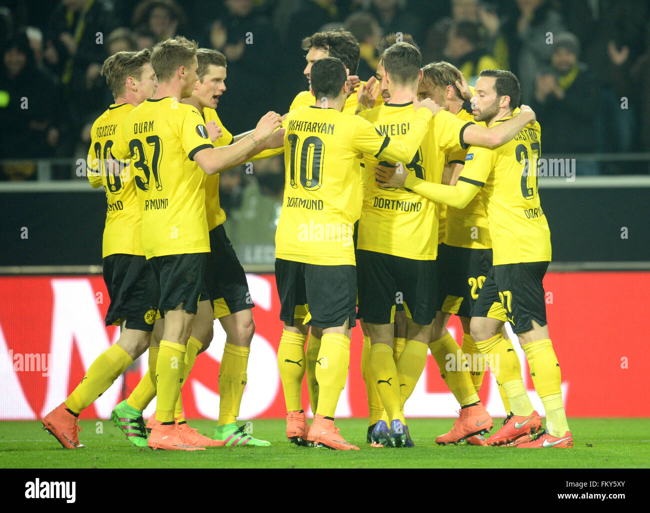 Dortmund, Germany. 10th Mar, 2016. Dortmund players celebrate the 1-0 ...