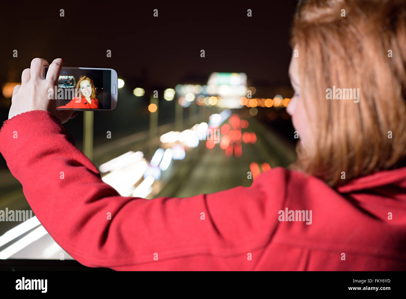 Red head woman, taking a selfie Stock Photo - Alamy