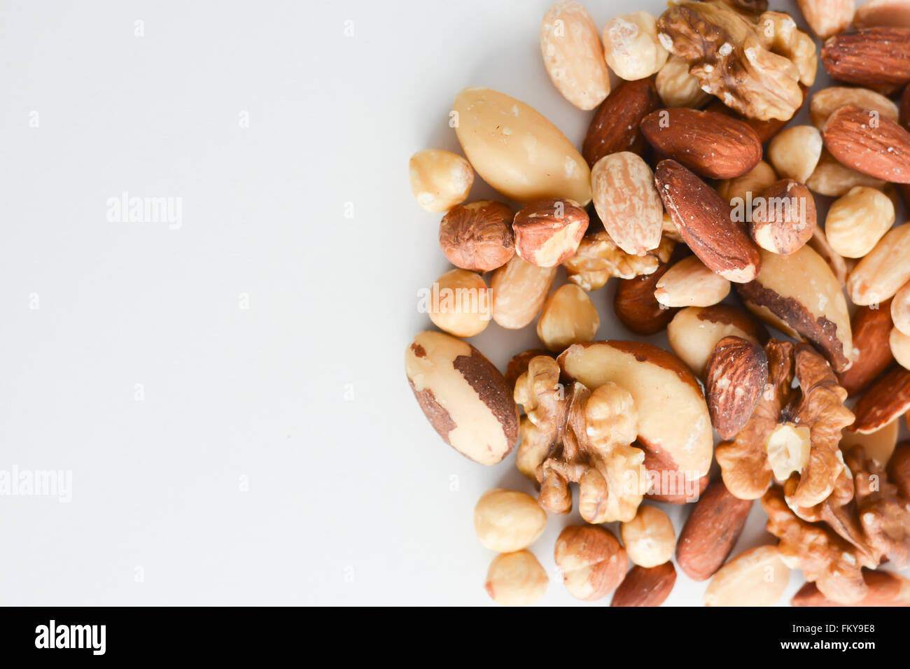Nut mix isolated on white background Stock Photo - Alamy