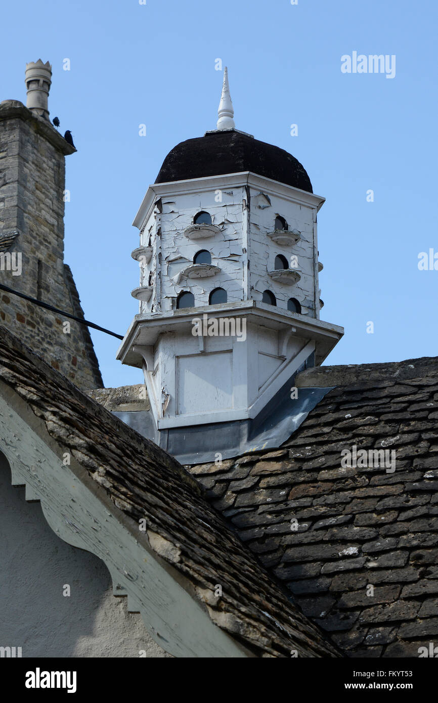 Dovecot on roof of building in the High Street of Burford, Oxfordshire ...