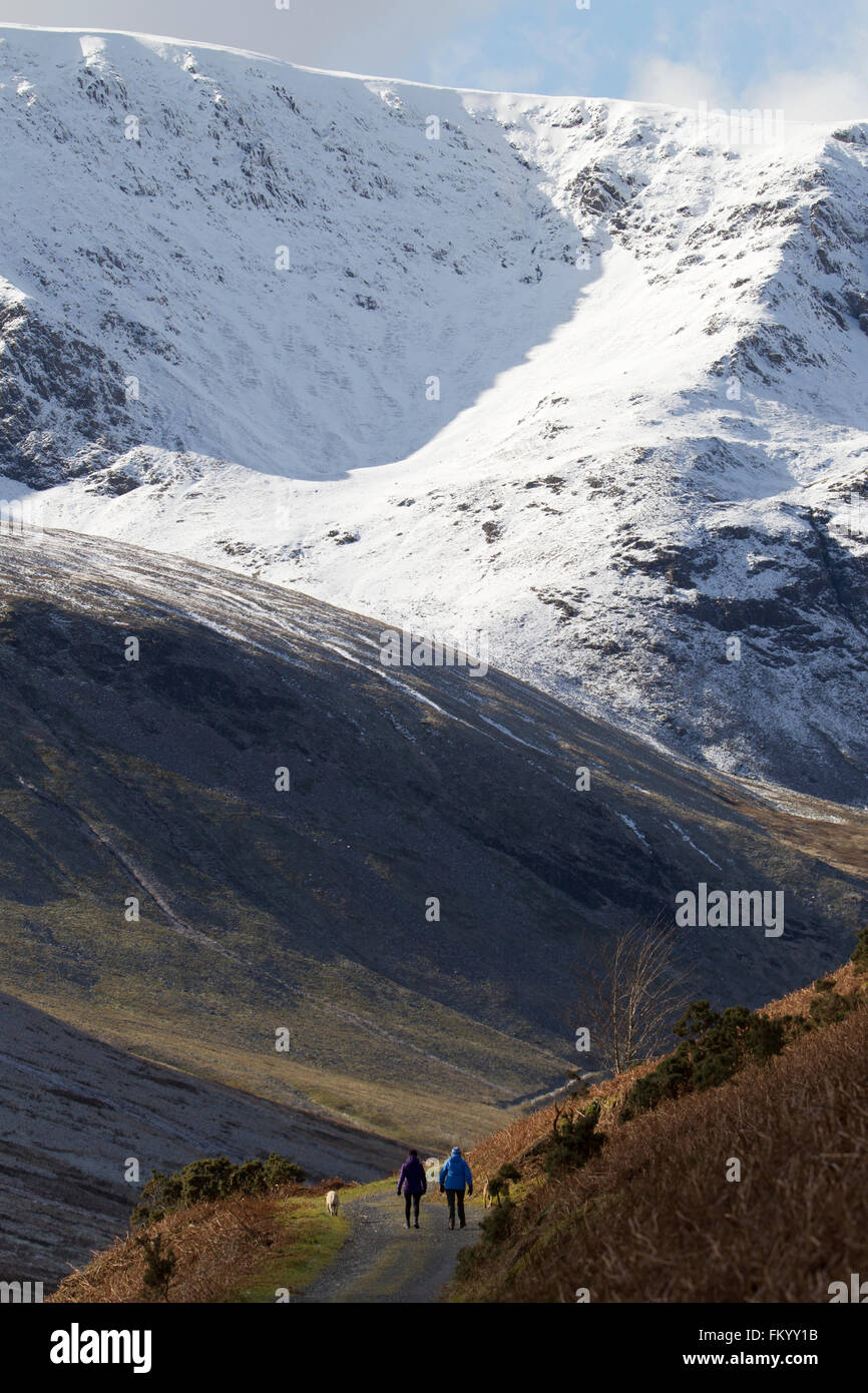unidentifiable walkers alongside Coledale beck below grizedal pike ...