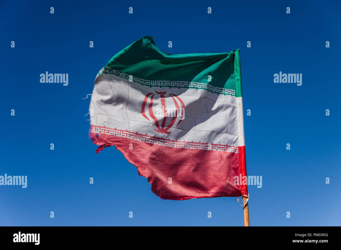 Iran flag waving in the wind in Teheran Stock Photo - Alamy