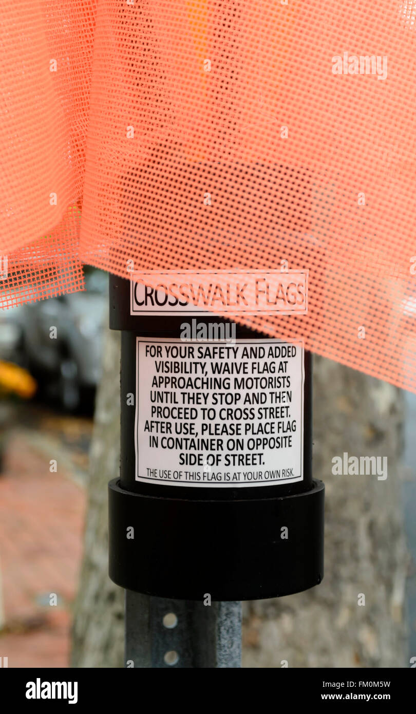 Orange Crosswalk Flags Stock Photo - Alamy