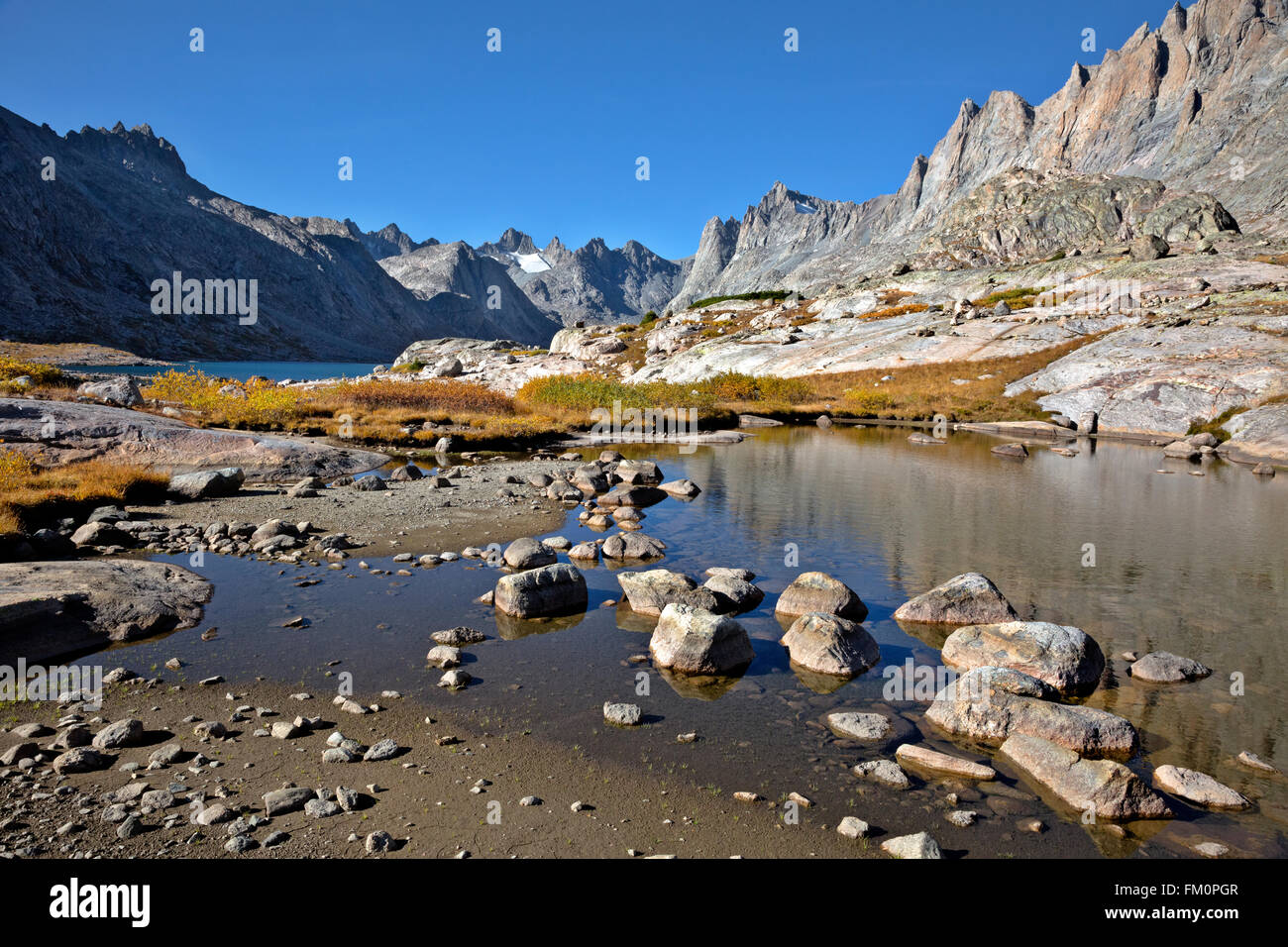 WY01265-00...WYOMING - Small rock filled tarn near Upper Titcomb Lake ...
