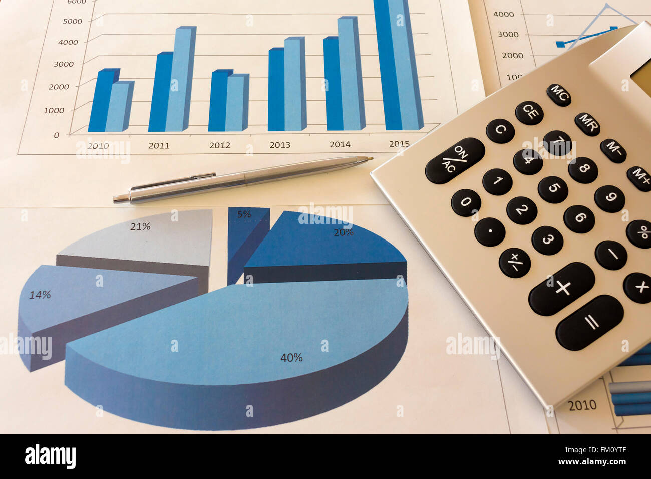 office desk with charts , histograms and financial documents Stock ...