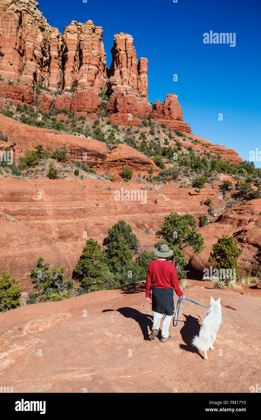 Man and dog hiking at Chicken Point in Sedona Stock Photo - Alamy