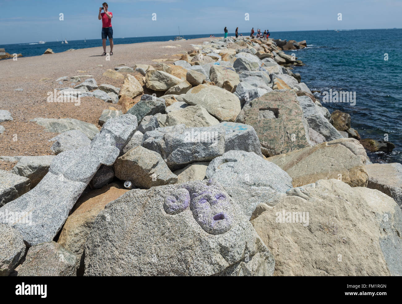 Carved stones of breakwater on the beach in La Barceloneta Barcelona ...
