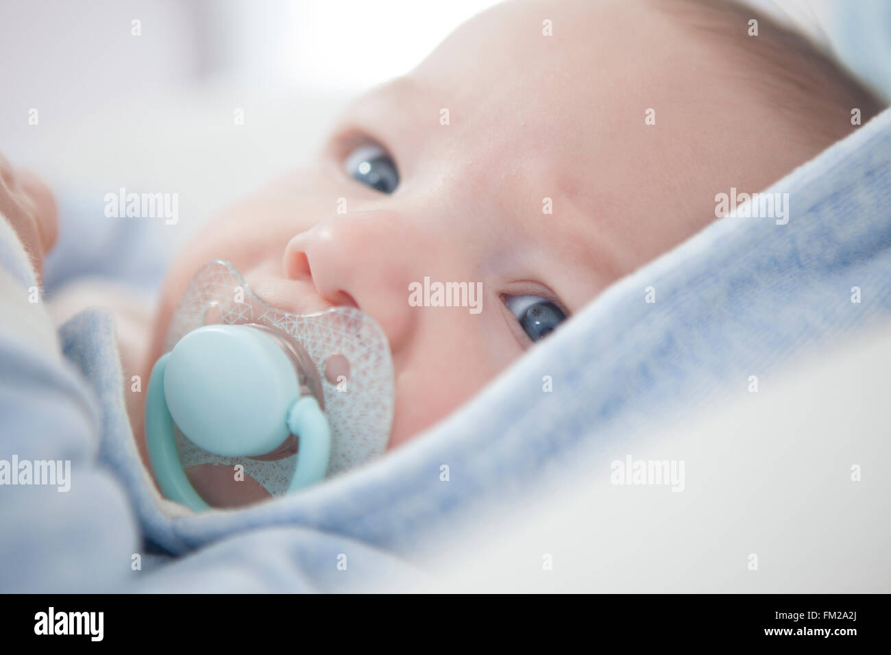 Toddler with a pacifier hi-res stock photography and images - Alamy