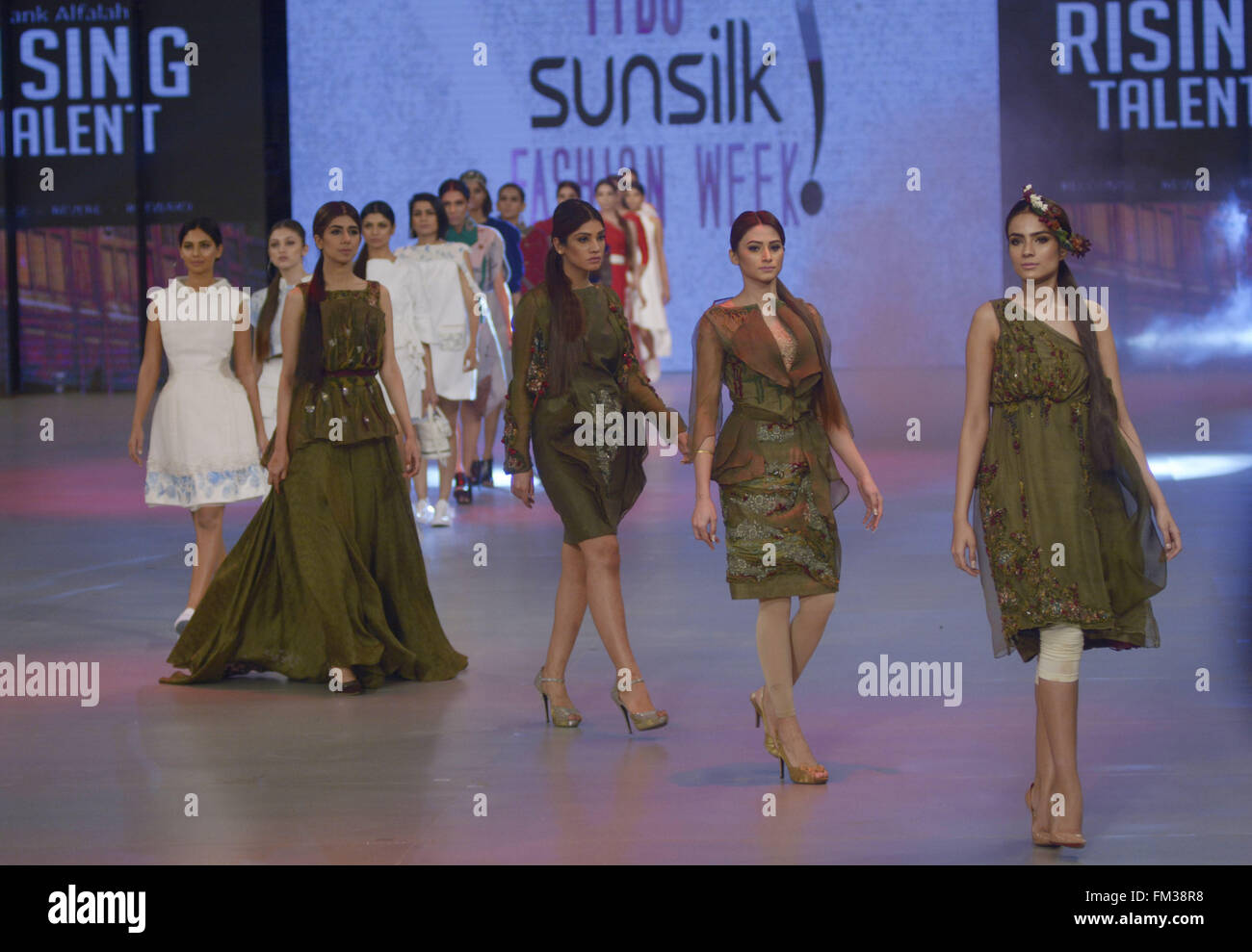 Lahore, Pakistan. 10th Mar, 2016. Pakistani models present creations of ...