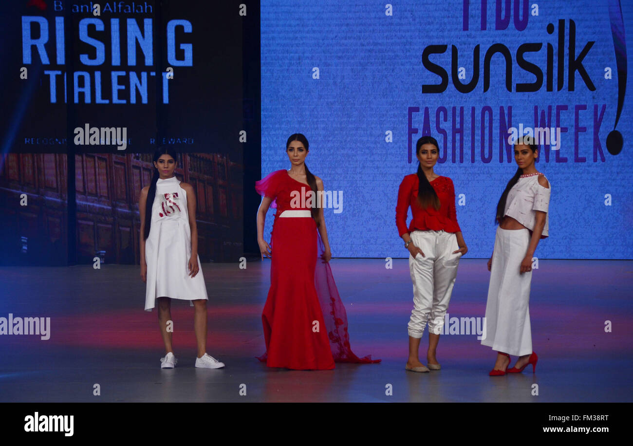 Lahore, Pakistan. 10th Mar, 2016. Pakistani models present creations of ...