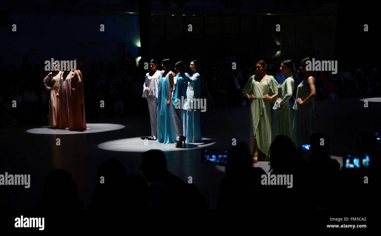 Lahore, Pakistan. 10th Mar, 2016. Pakistani models present creations of ...