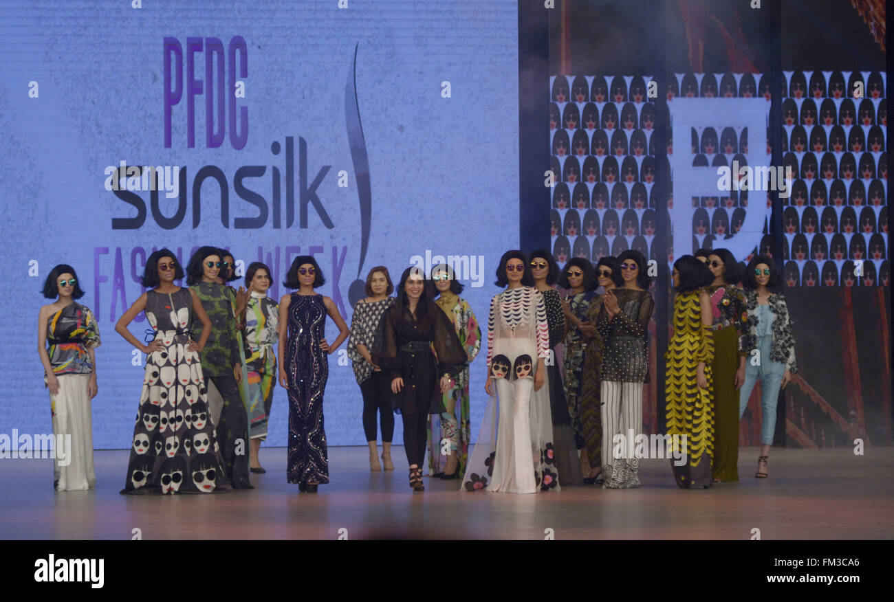 Lahore, Pakistan. 10th Mar, 2016. Pakistani models present creations of ...