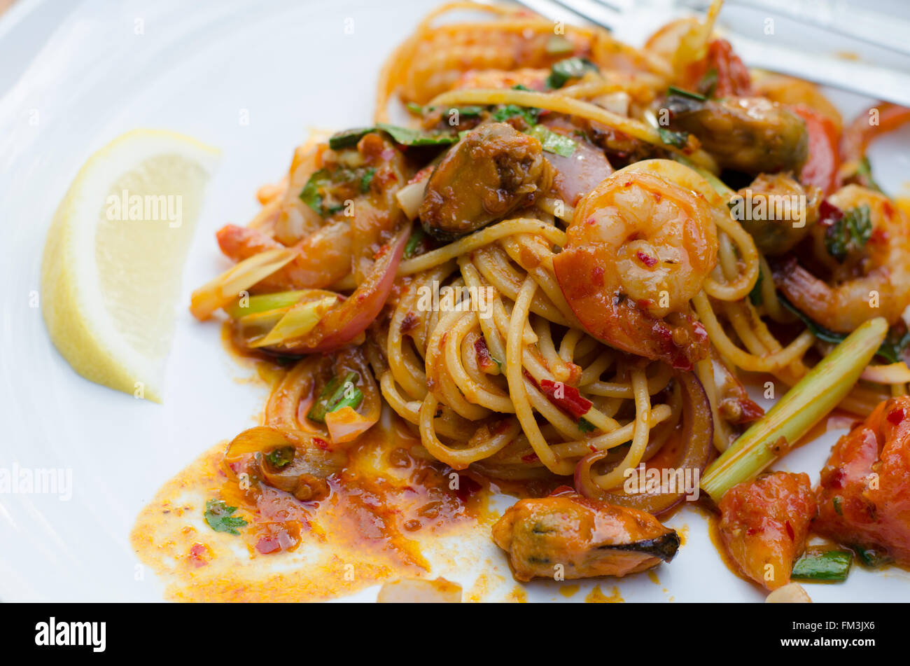 tom yum spaghetti, thai food Stock Photo - Alamy