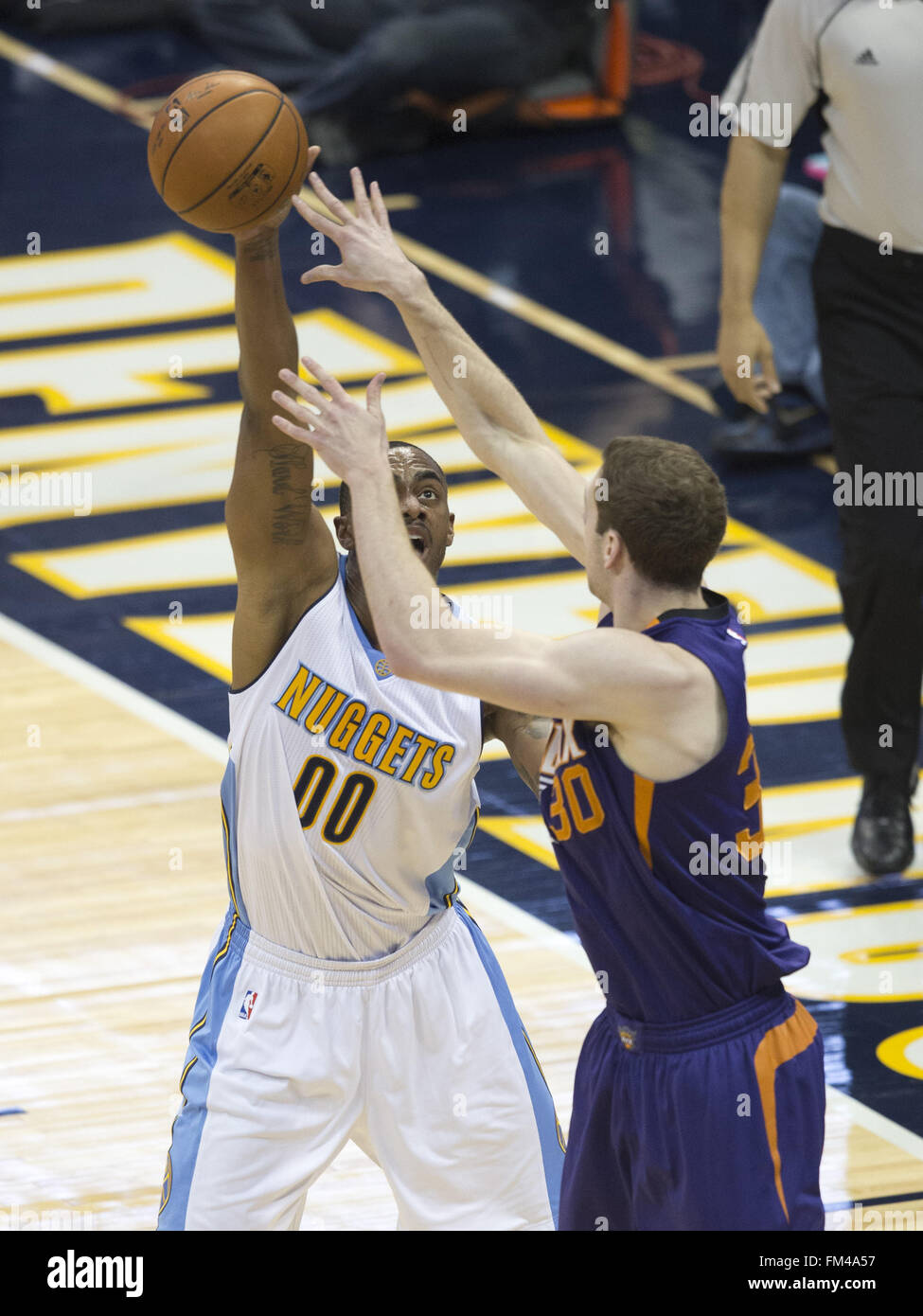 Denver, Colorado, USA. 10th Mar, 2016. Nuggets DARRELL ARTHUR, left ...