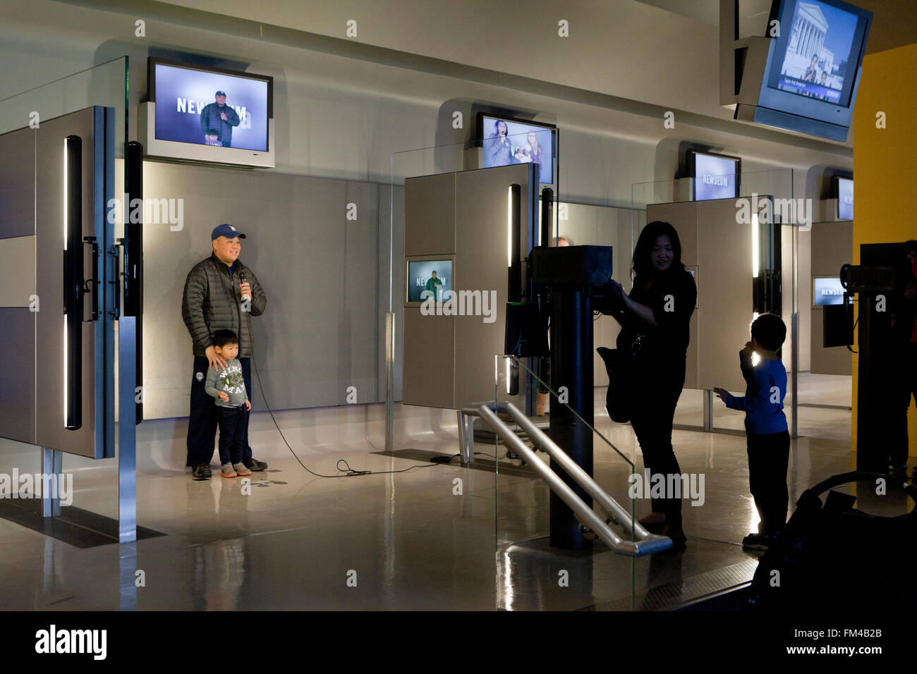 Newseum visitors at the "Be A TV Reporter" exhibit - Washington, DC USA ...
