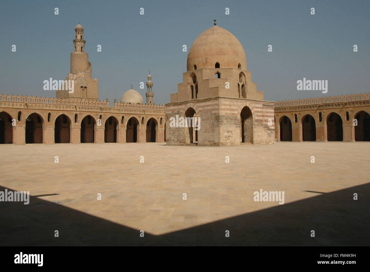 The ablution fountain (sabil) and the minaret with a spiral staircase ...