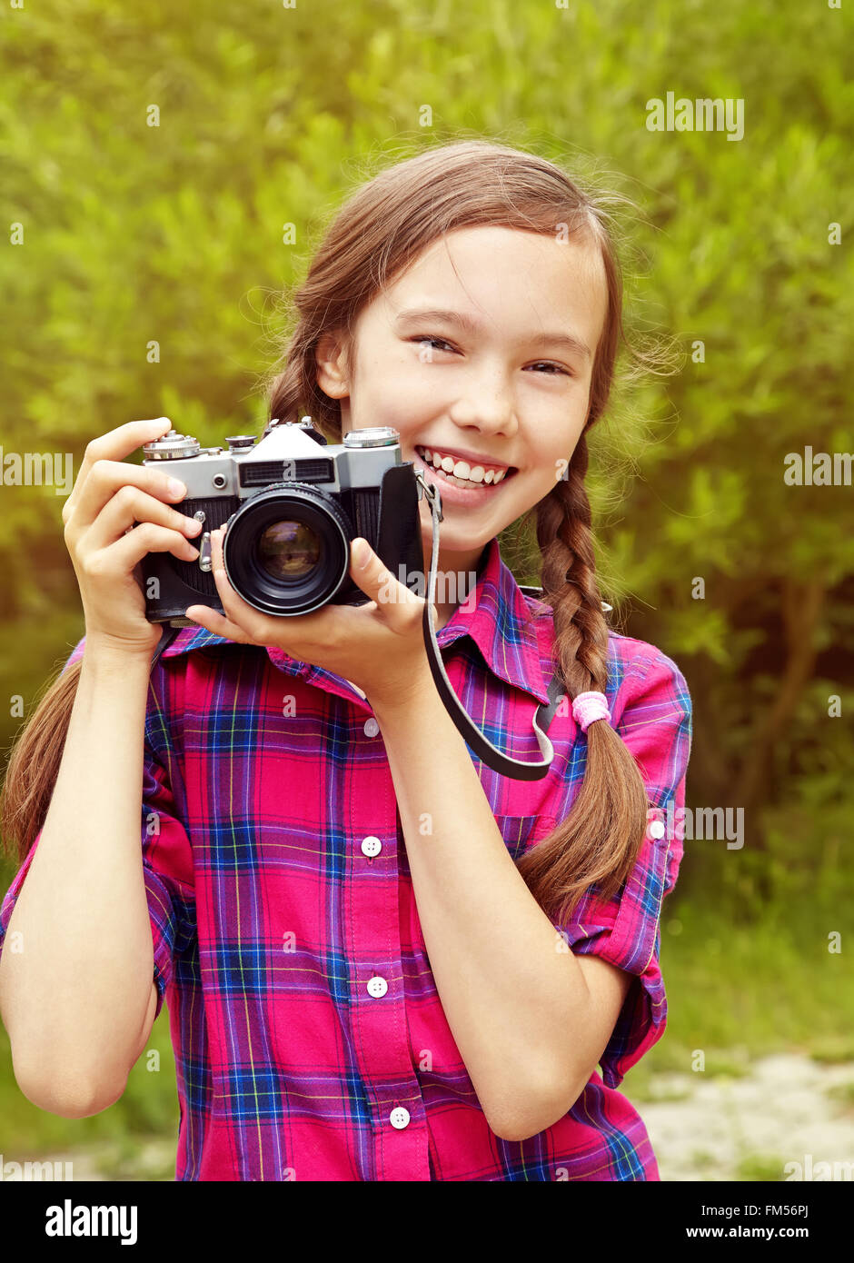 teenage girl with a camera Stock Photo - Alamy