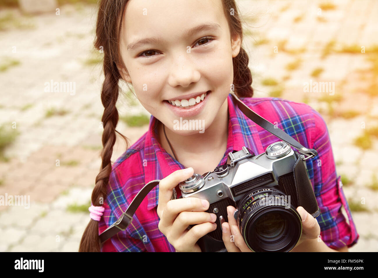 teenage girl with a camera Stock Photo - Alamy