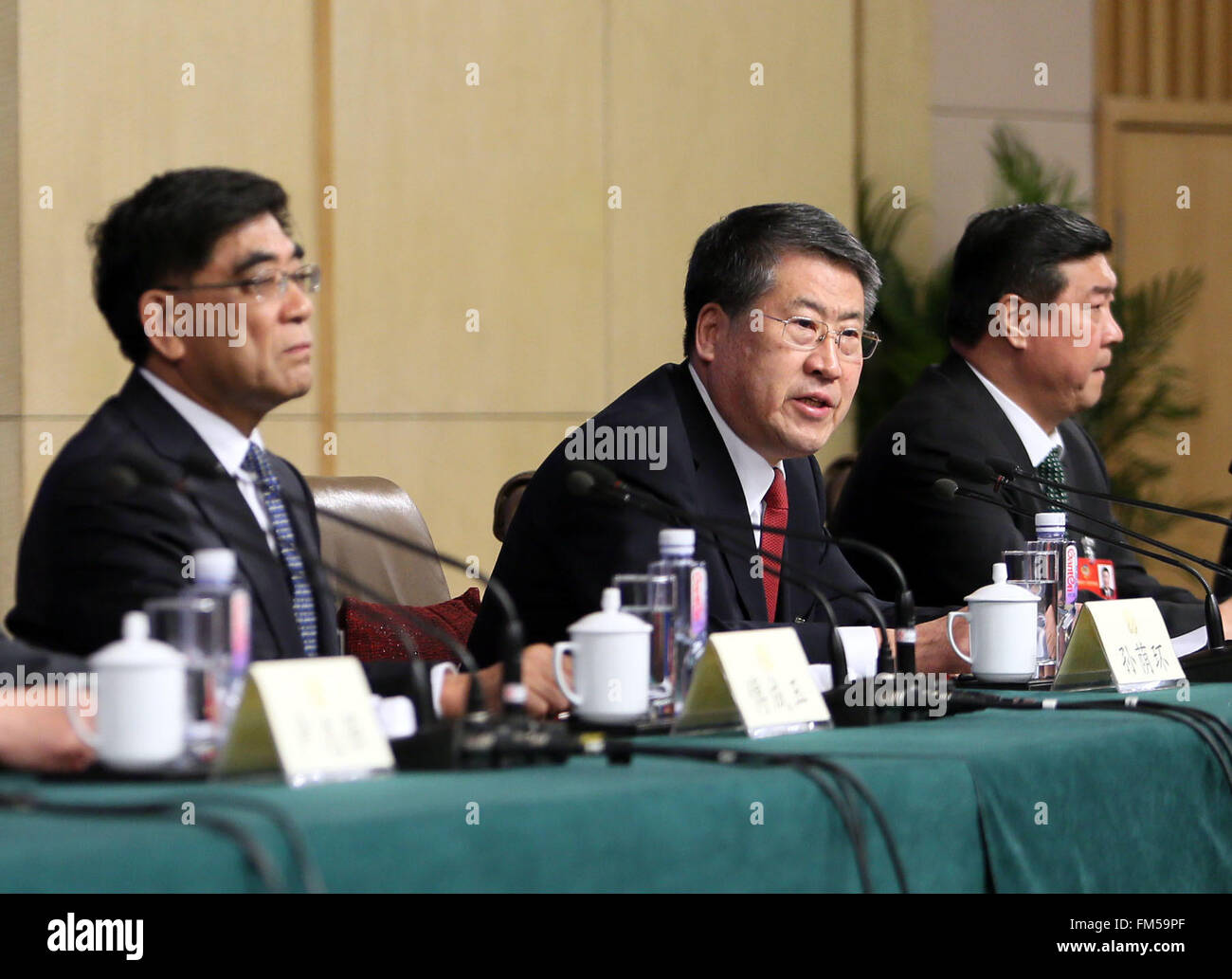 Beijing, China. 11th Mar, 2016. Sun Yinhuan (C), a member of the 12th ...