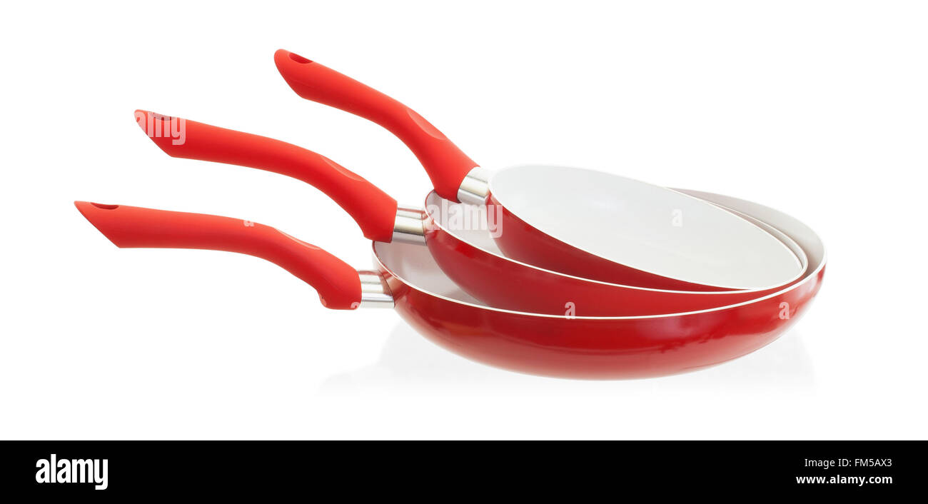 Set of three frying pans, isolated, close-up, red Stock Photo - Alamy