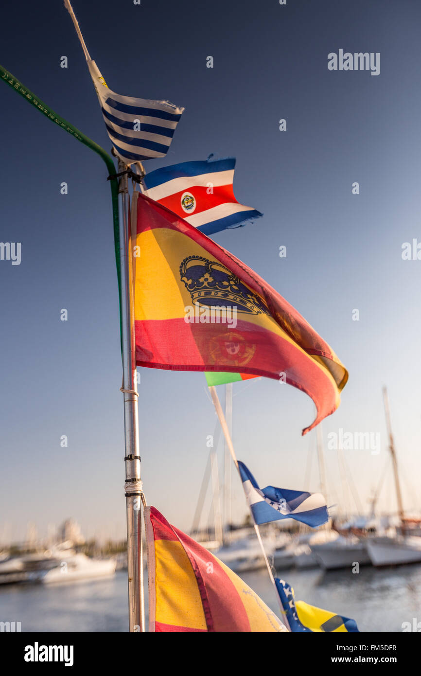 Some national flags fluttering on the rope Stock Photo - Alamy