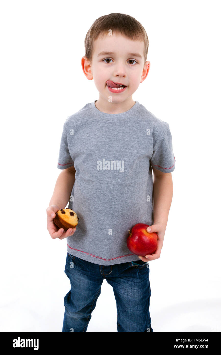 little boy with food isolated on white background - apple or a muffin ...