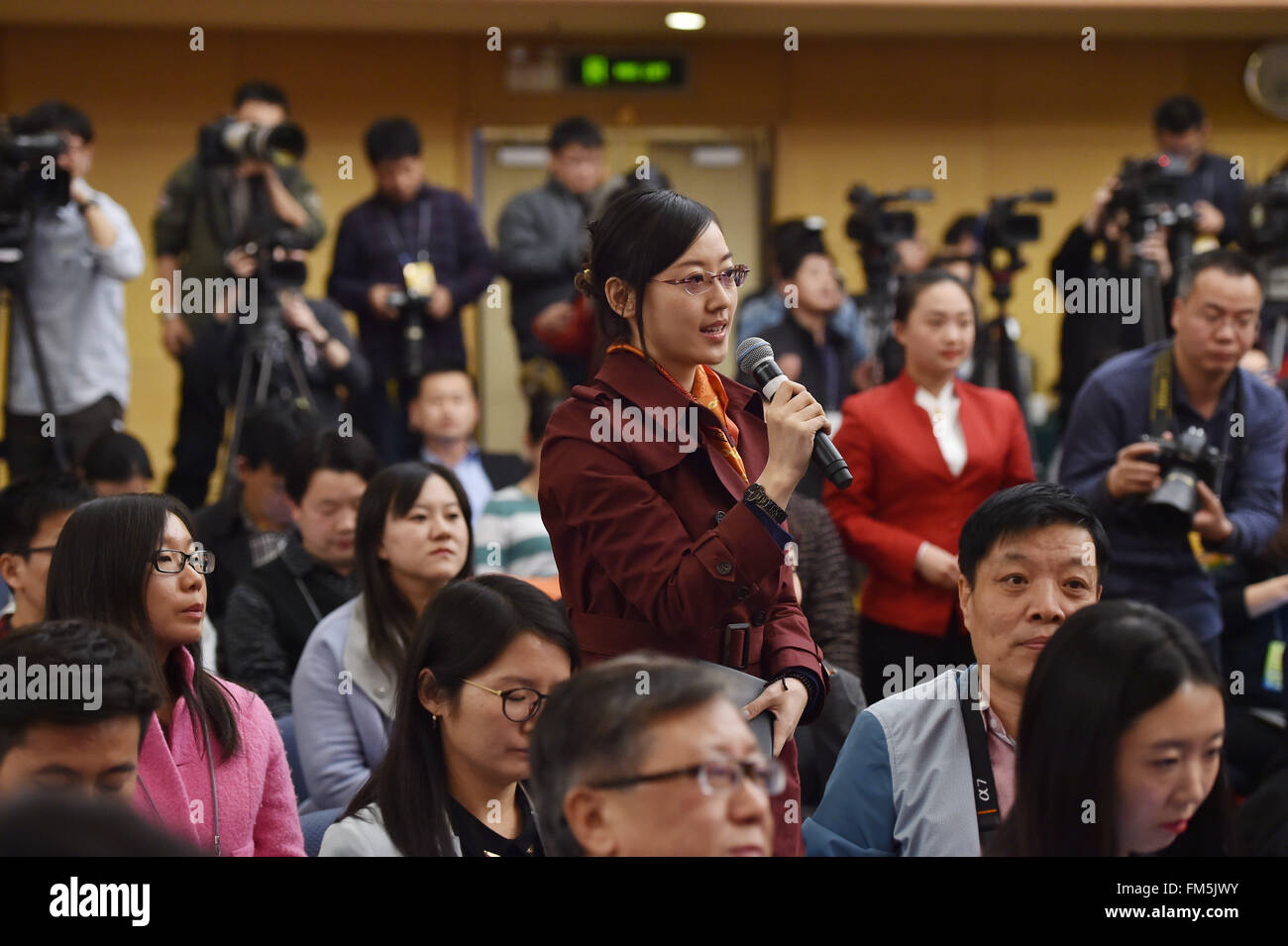 Beijing, China. 11th Mar, 2016. A journalist with Xinhua News Agency ...