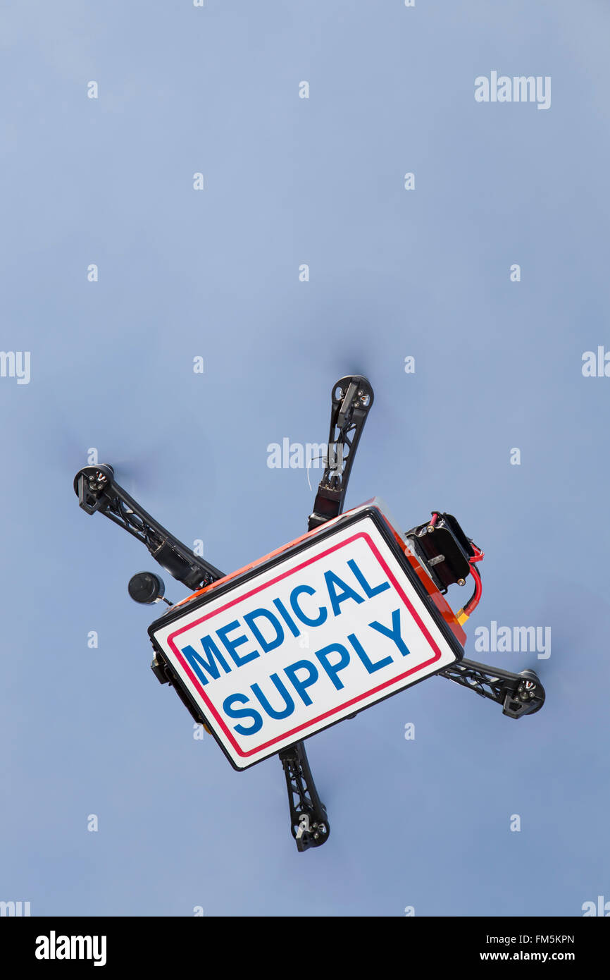 UAV drone quadrocopter with modern GPS navigation transporting box with ...