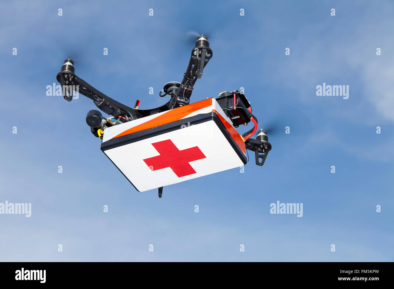 UAV drone quadrocopter with modern GPS navigation transporting box with ...