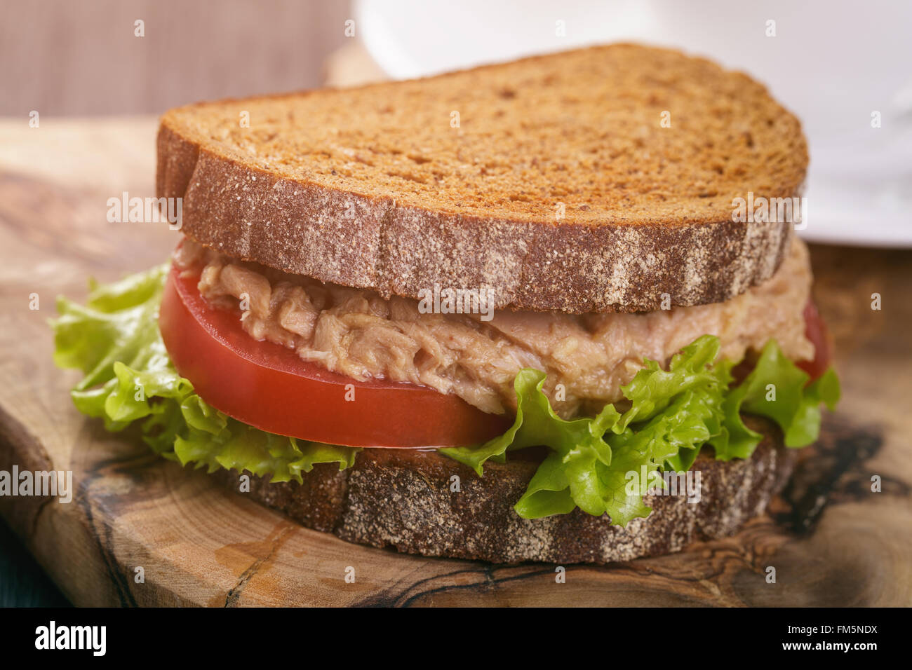 rye bread sandwich with tuna and coffee Stock Photo - Alamy