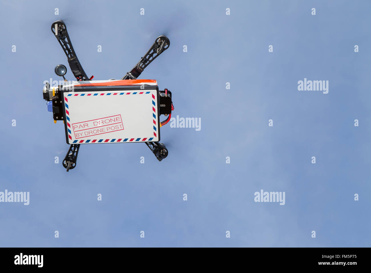 UAV drone quadrocopter with modern GPS navigation transporting express ...