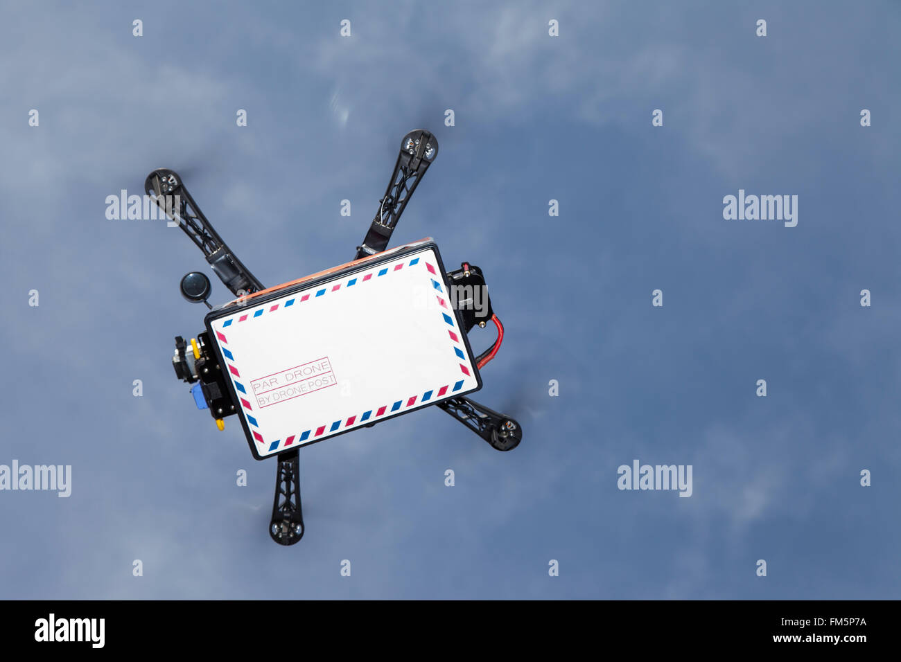 UAV drone quadrocopter with modern GPS navigation transporting express ...