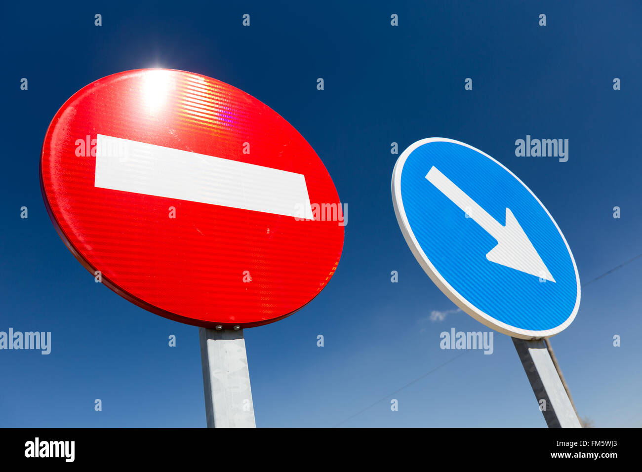 No entry and Pass this side signs Stock Photo - Alamy