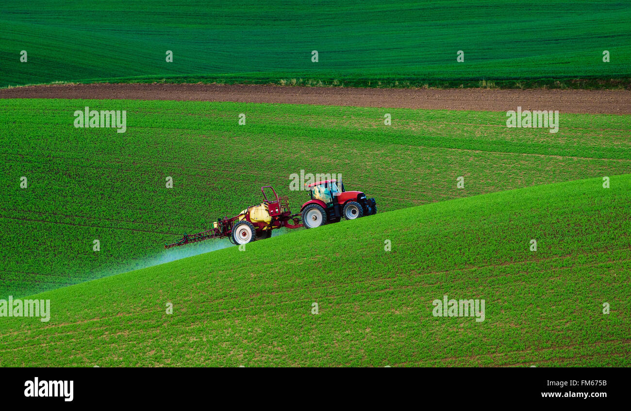 Farm machinery spraying insecticide Stock Photo - Alamy