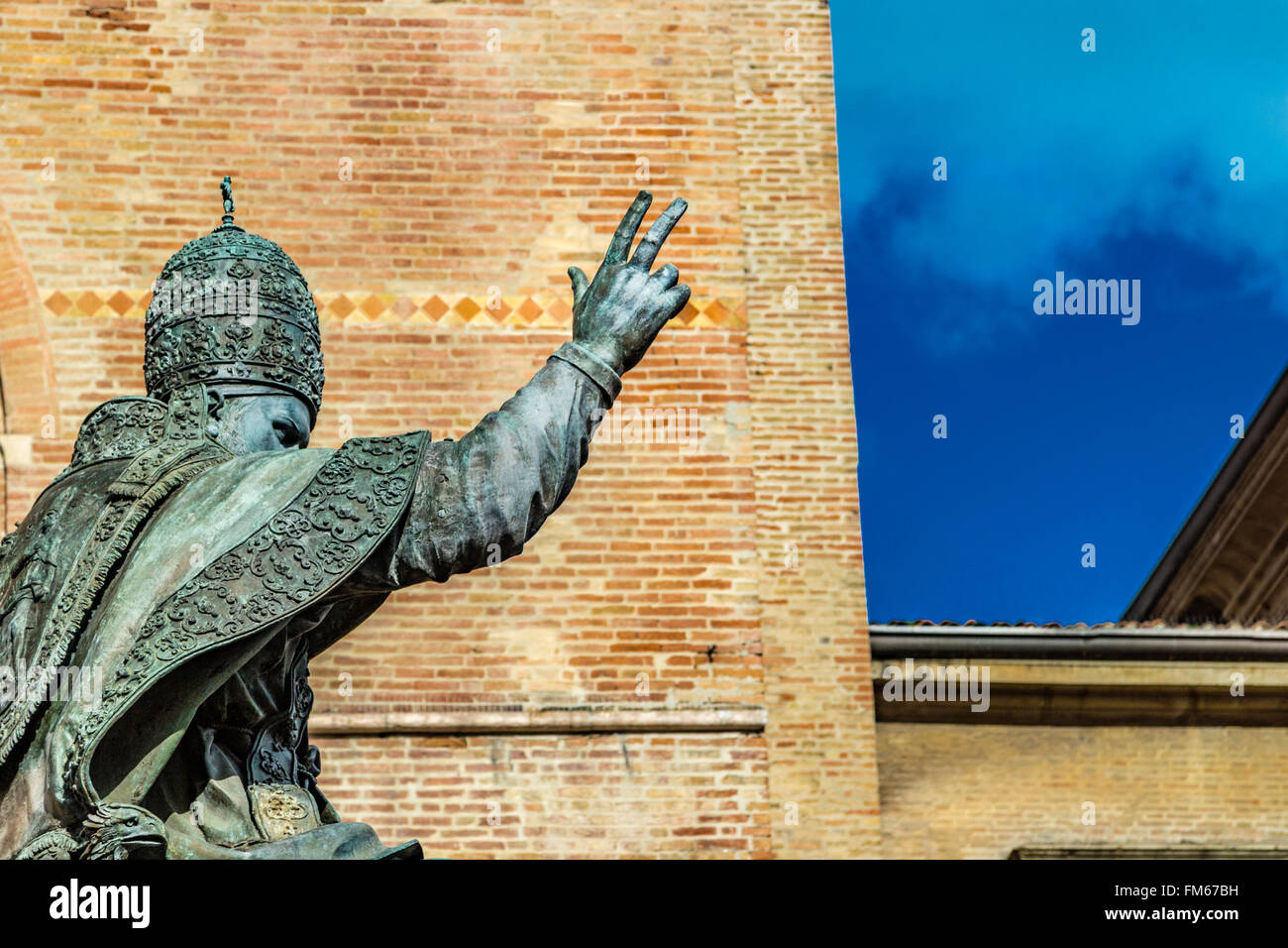 statue of Pope raises his hand in blessing to the sky Stock Photo - Alamy