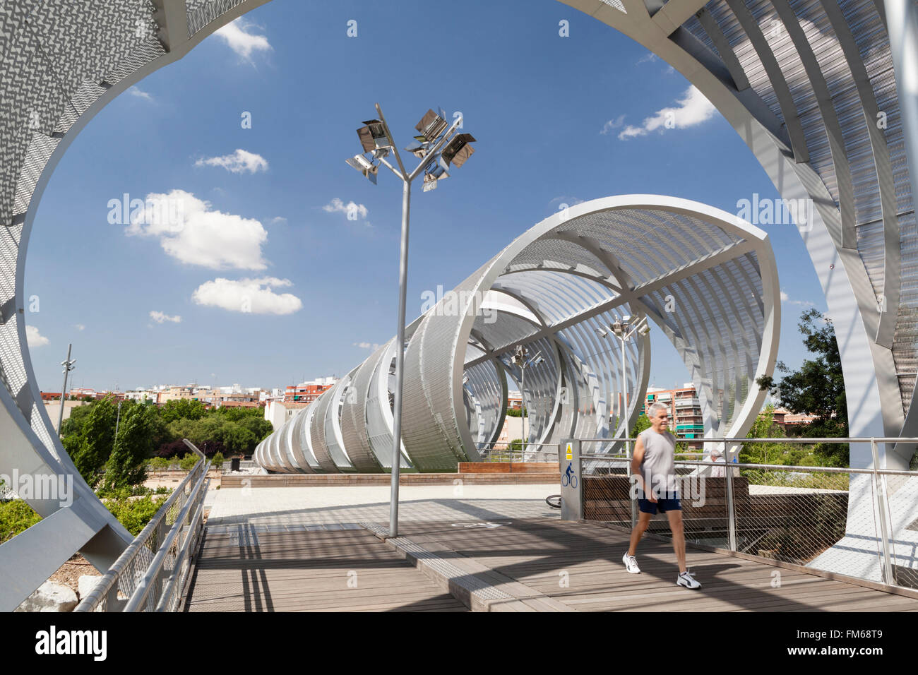 A view of a modern new bridge structure in Madrid called The Pasarela ...