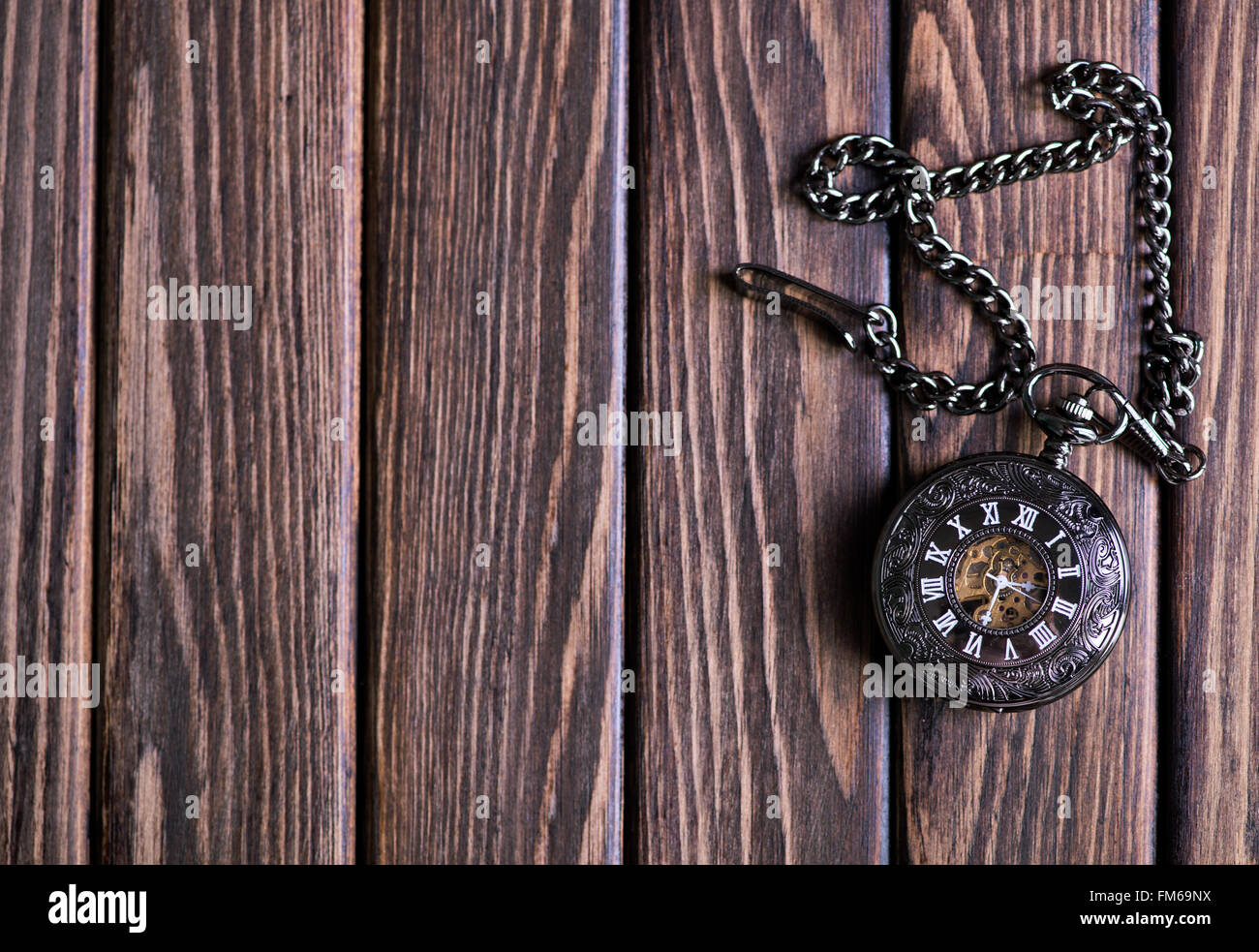 Vintage pocket watch and hour glass or sand timer, symbols of time with ...