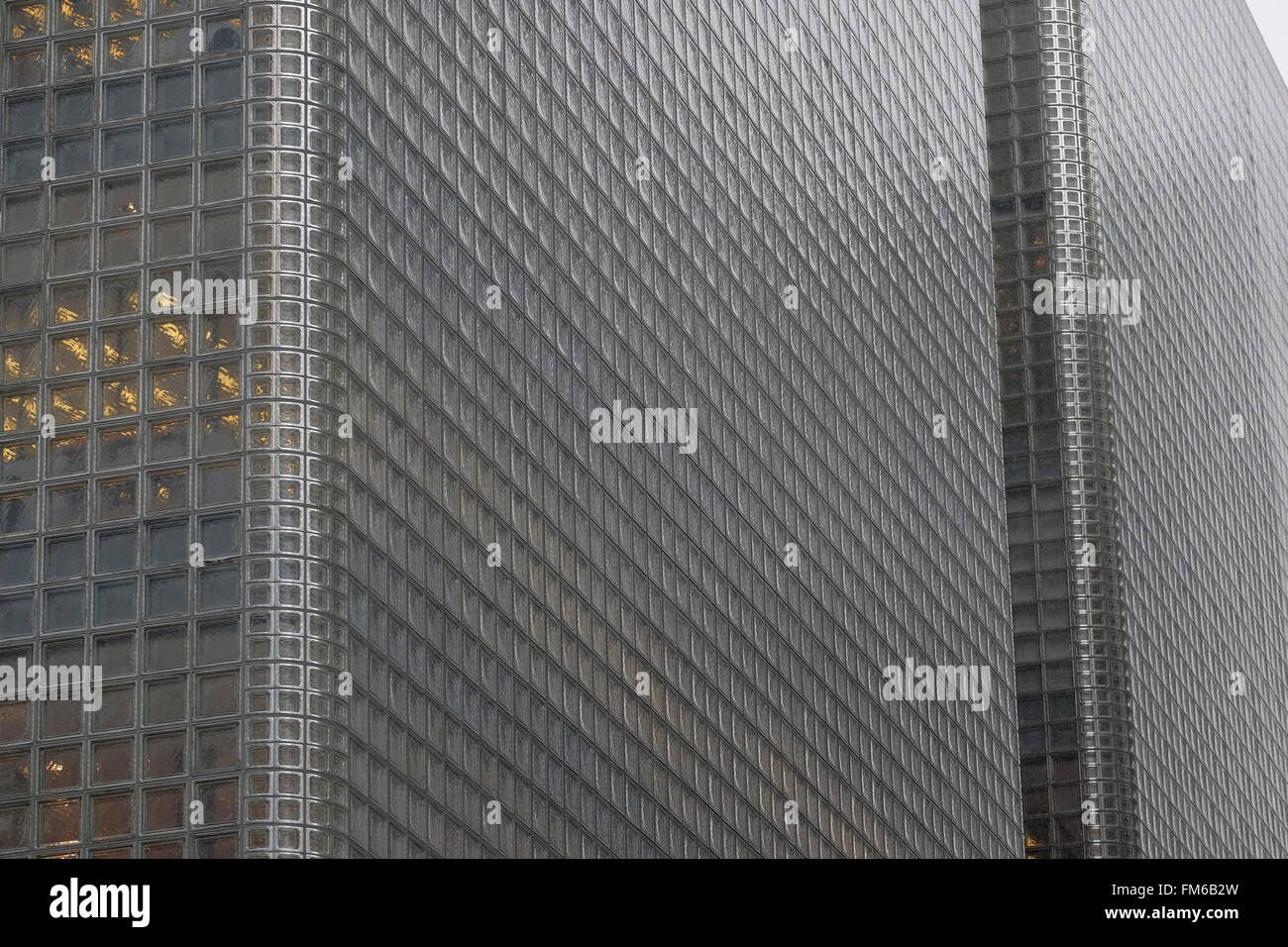A section of an ultra modern building in Tokyo, The Hermes towers over ...