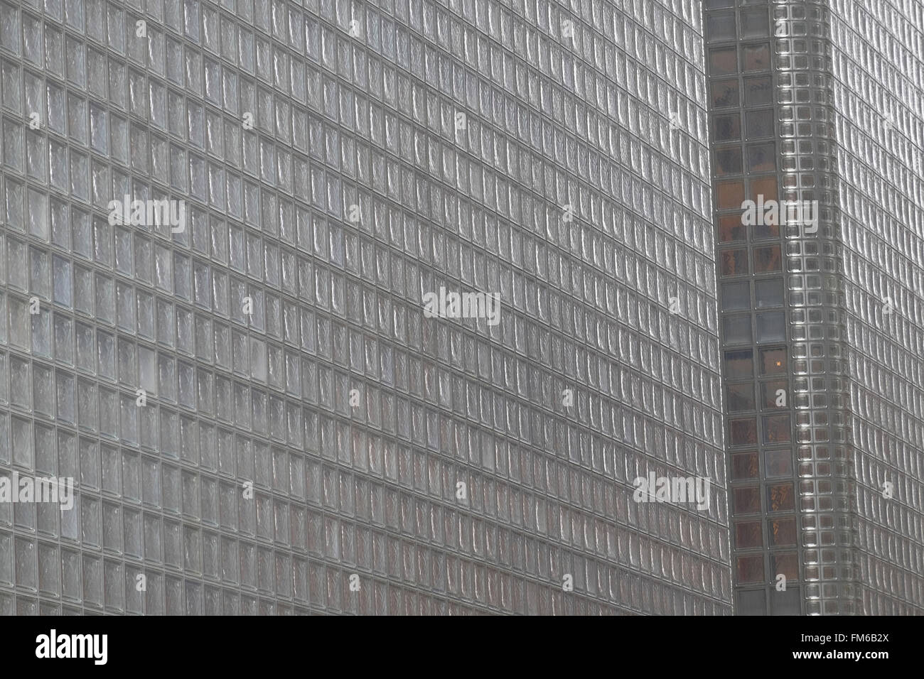 A section of an ultra modern building in Tokyo, The Hermes towers over ...