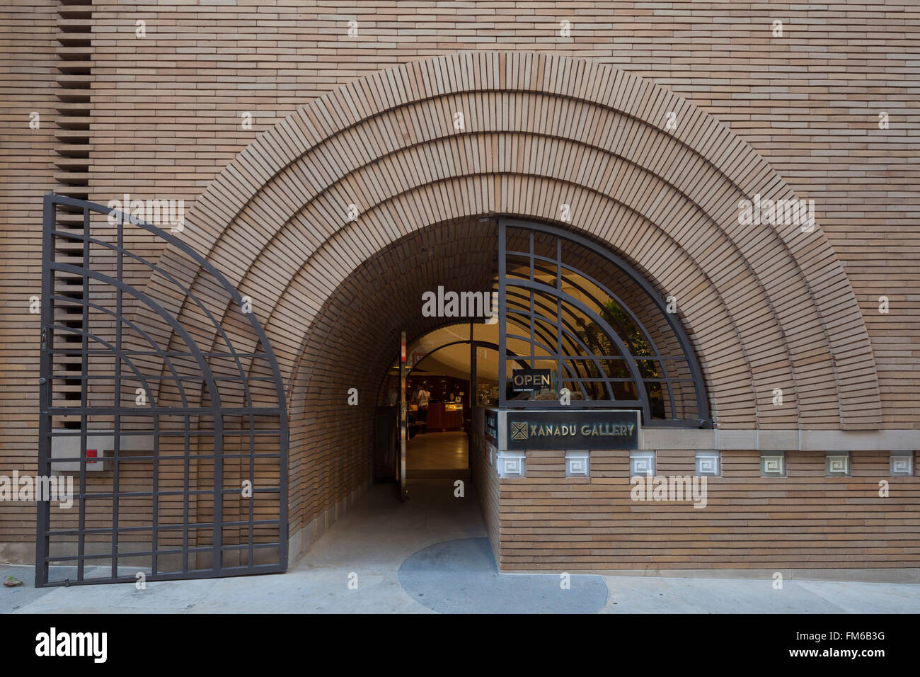 An exterior view of the arched entrance to a building in San Francisco ...
