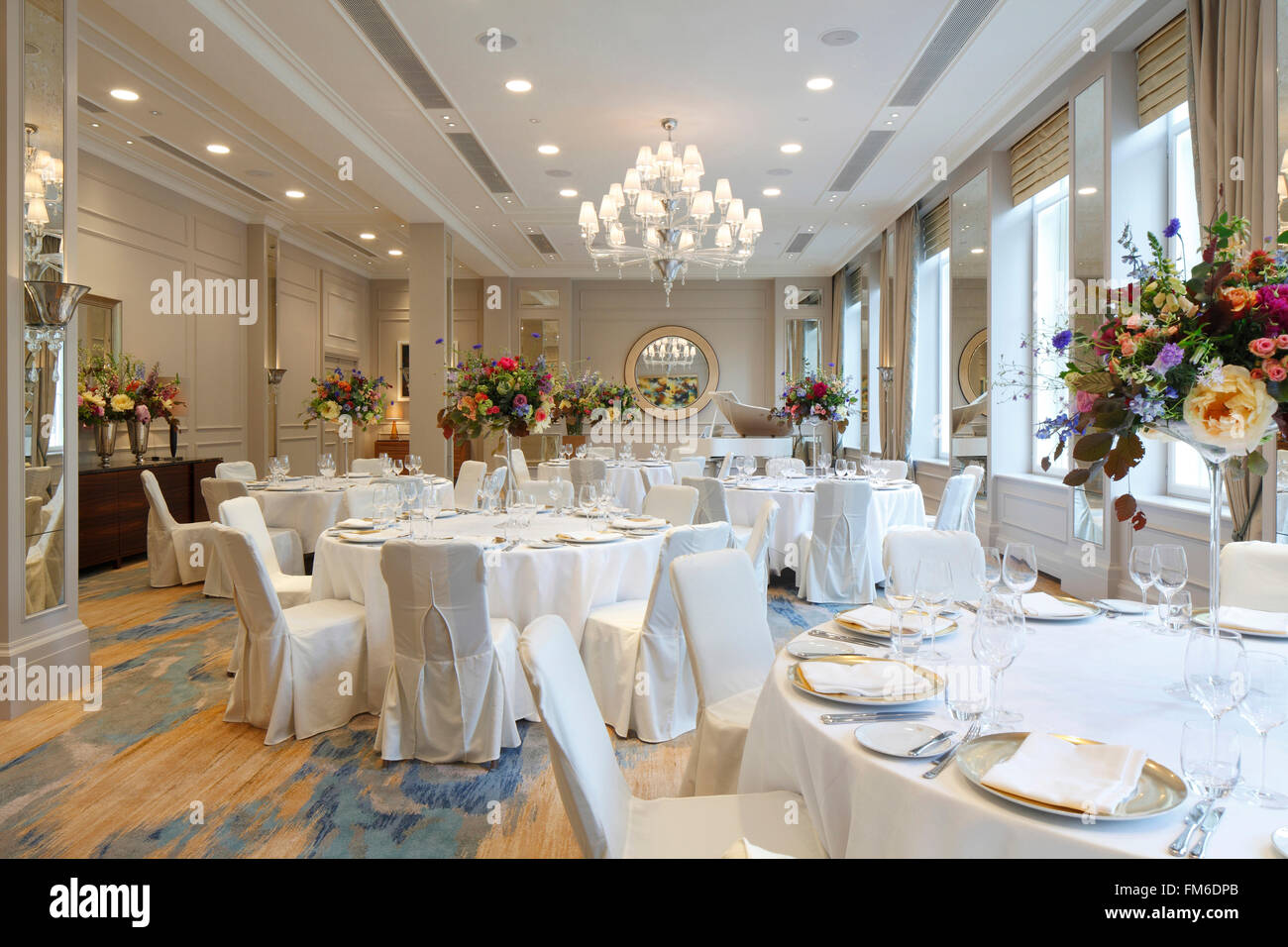 An interior view of a function room. With a chandelier hanging in the ...