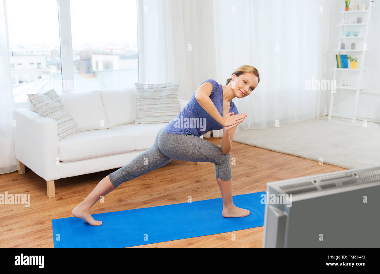 Low lunge twist pose hi-res stock photography and images - Alamy
