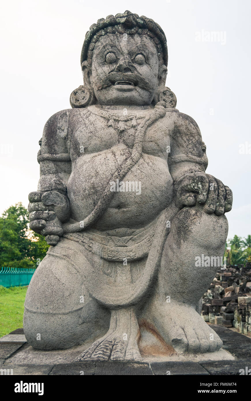 A statue at the entrance to the Sewu ancient Buddhist temple, Central ...
